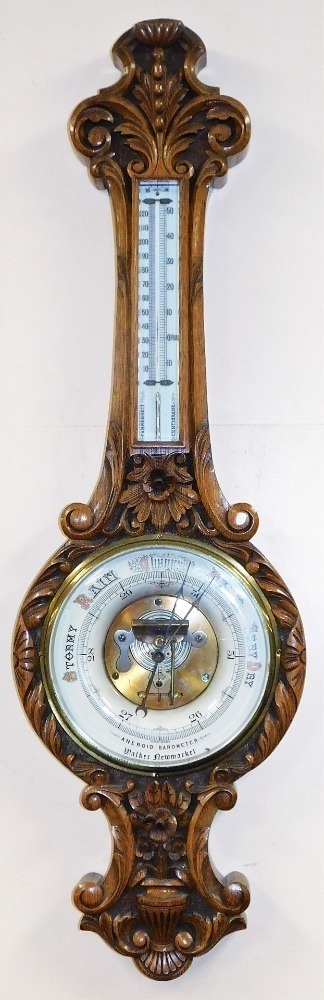 A Victorian oak cased Walker of Newmarket aneroid wall barometer, with ...