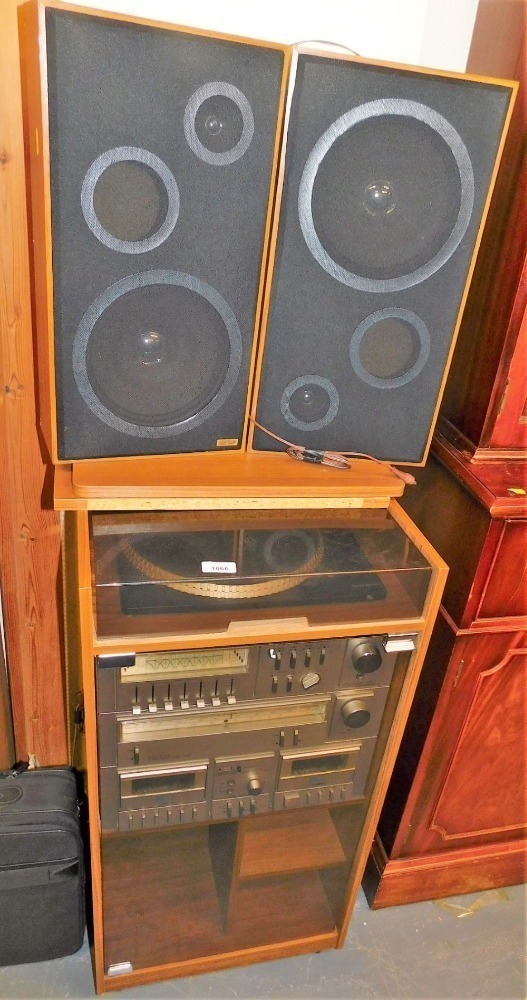An Amstrad music system, with turntable, stereo tuner, double cassette ...