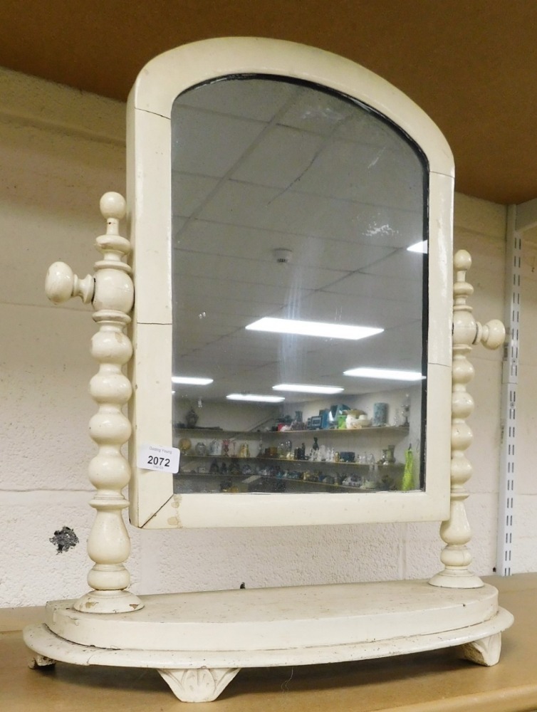 A Victorian cream painted tilt top mirror, on bobbin turned supports ...