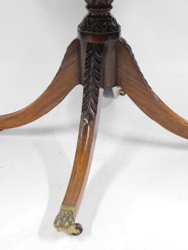 A 19thC mahogany dining table, the circular top of plain design on ...