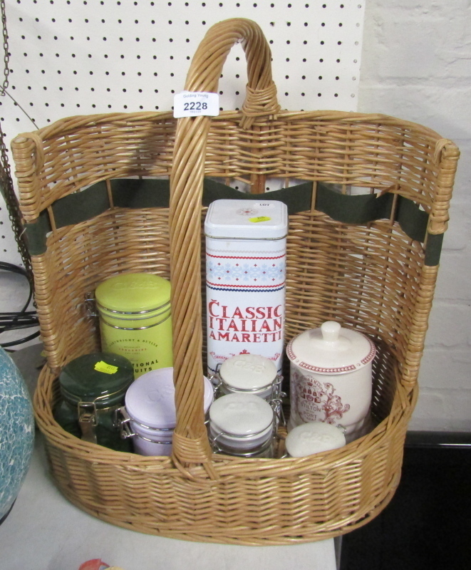A wicker basket and contents of Cartwright & Butler Traditional tins ...