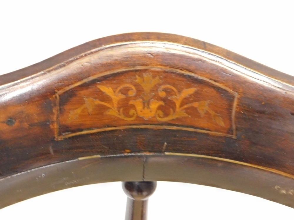 A pair of Edwardian corner chairs, each upholstered in buttoned ...