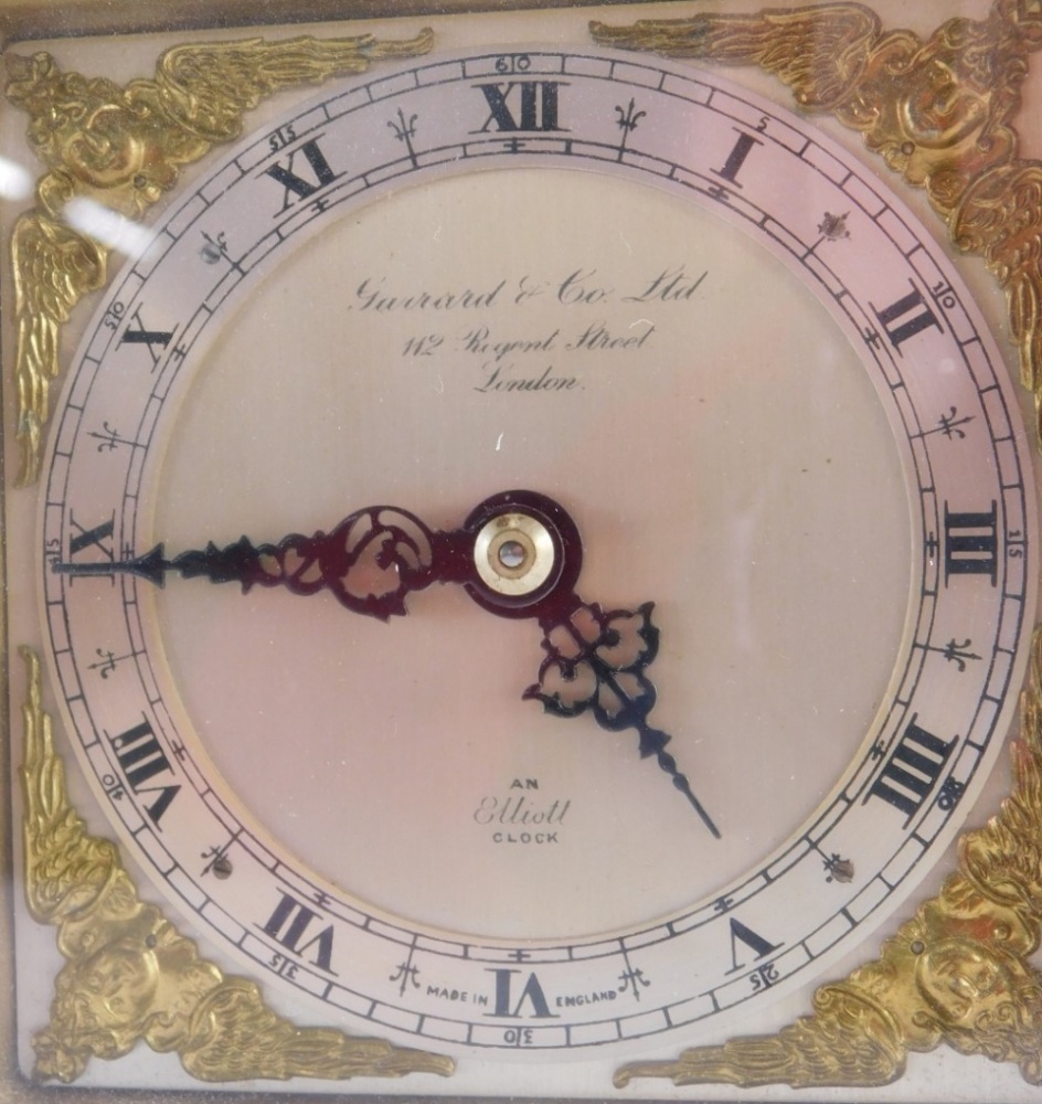A Garrard and Co mantel clock, with Elliott movement, the 9cm diameter ...