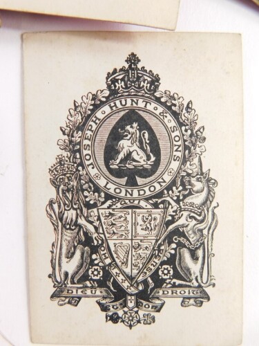 A quantity of Joseph Hunt and Sons playing cards, with pink backs and ...