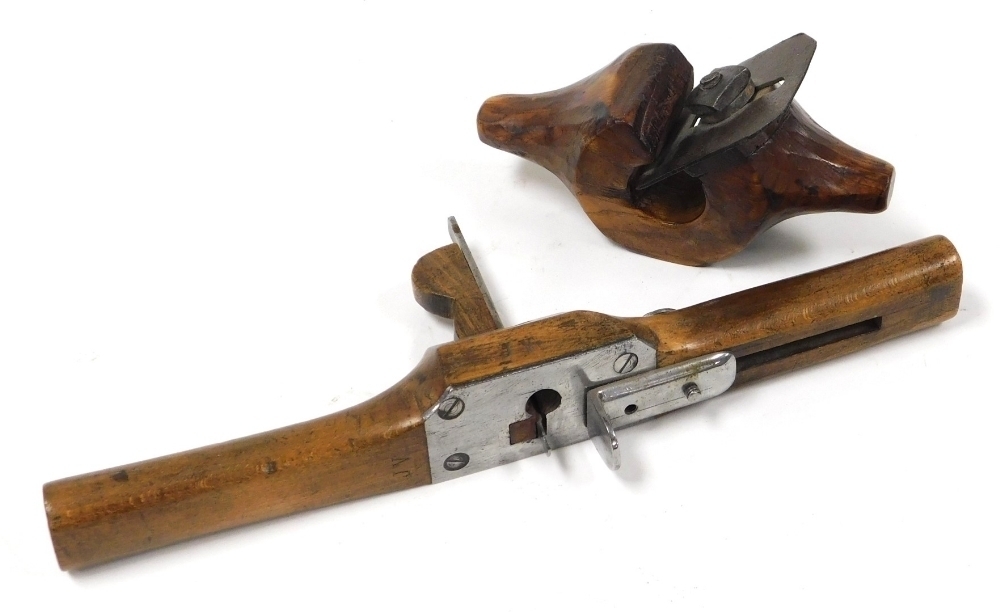 A vintage wooden and cast iron rounding plane, stamped WS, 19cm wide ...