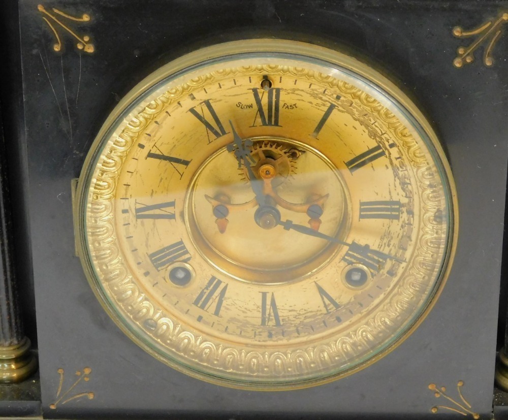 A Victorian slate mantel clock, circular brass dial with visible brocot ...