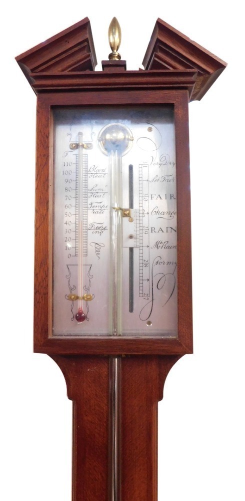 A modern mahogany cased stick barometer, with a silvered dial, 94cm high.