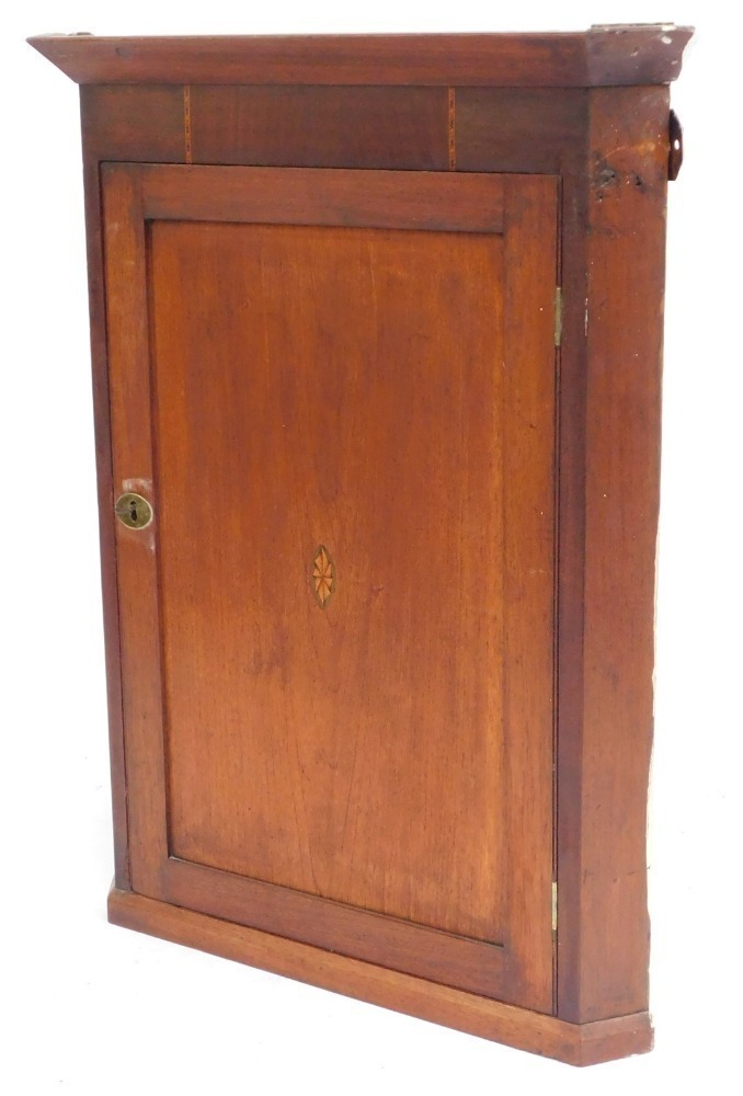 A George III oak and mahogany hanging corner cupboard, with shell ...