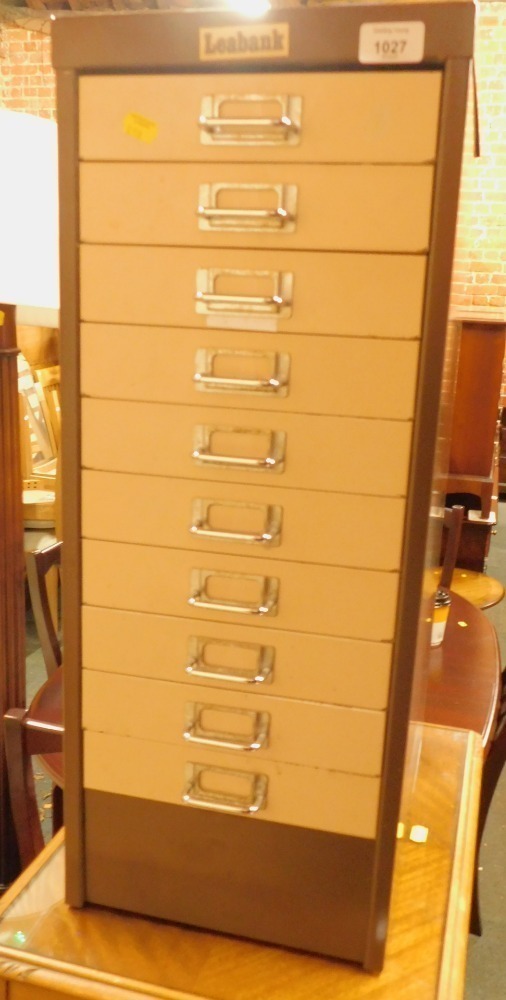 A Leabank ten drawer filing cabinet, in cream and brown.