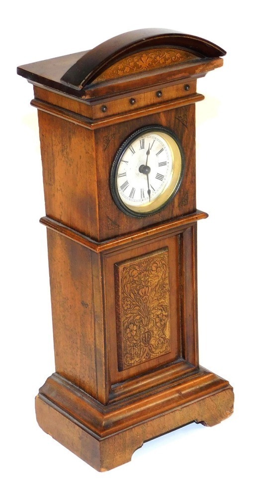 An early 20thC wooden cased miniature longcase clock, circular silvered ...
