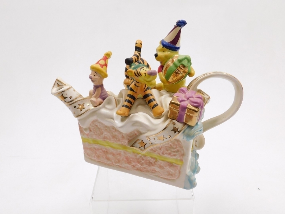 Three Disney pottery teapots, comprising Disney Showcase Collection ...