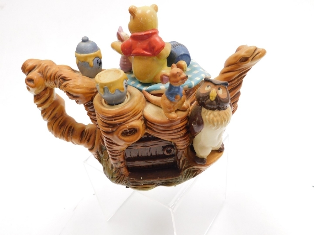 Three Disney pottery teapots, comprising Disney Showcase Collection ...