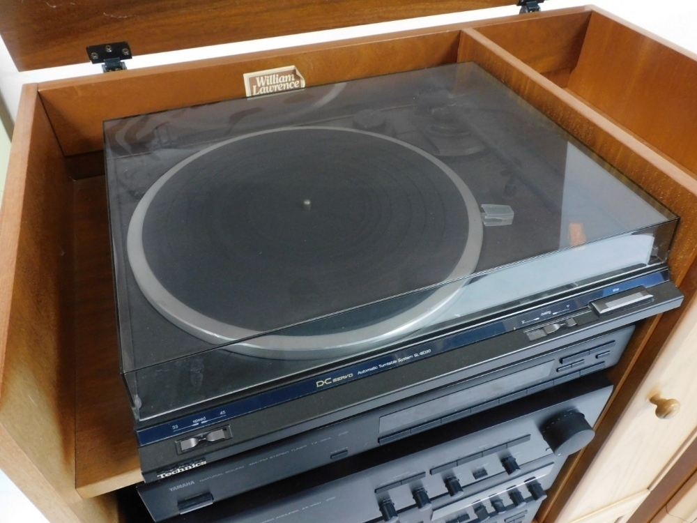 A William Lawrence light teak hi-fi cabinet, containing a Technics DC ...