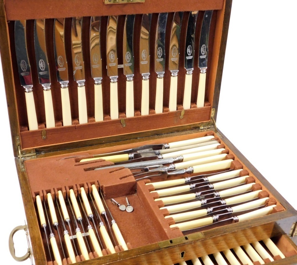 An early 20thC Staybrite stainless steel canteen of cutlery, in a three ...