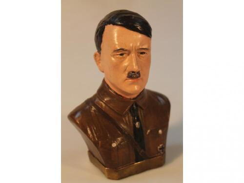 A reproduction cast metal bust of Adolf Hitler