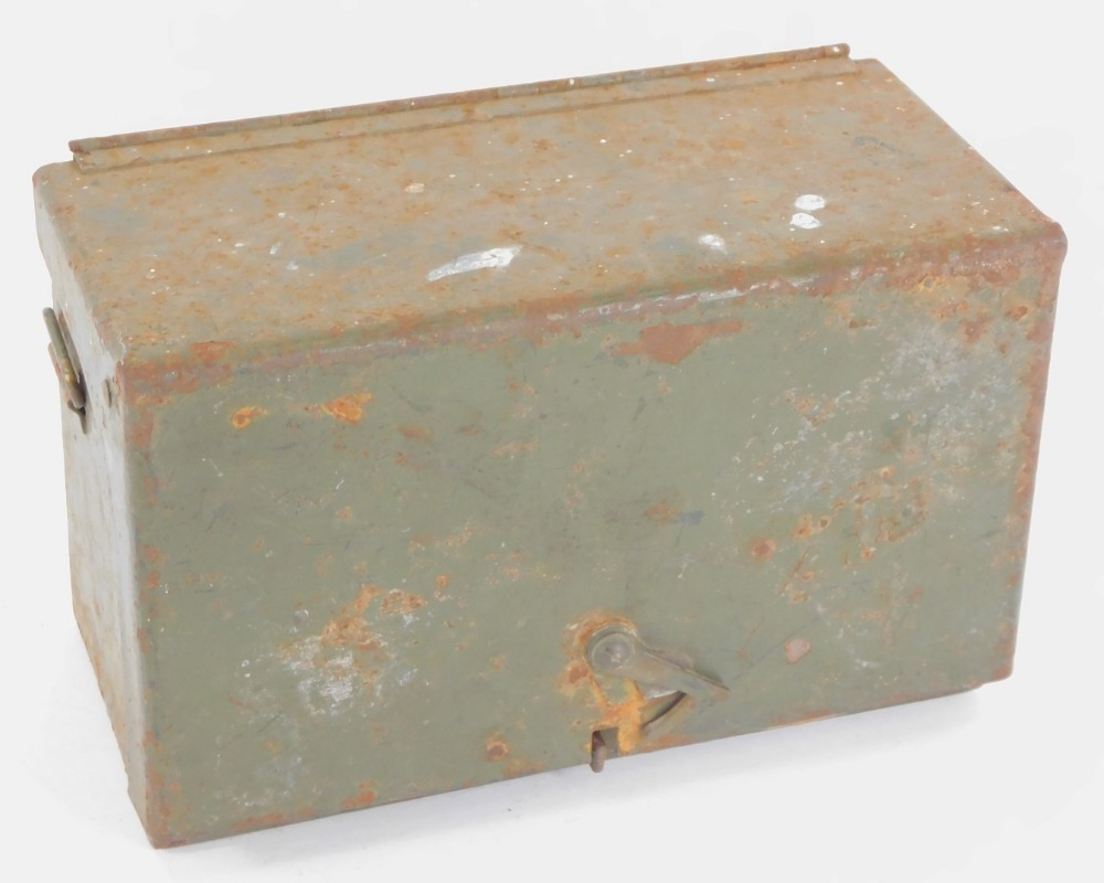 A World War II cased military telephone, in green cased tin, stamped MK ...