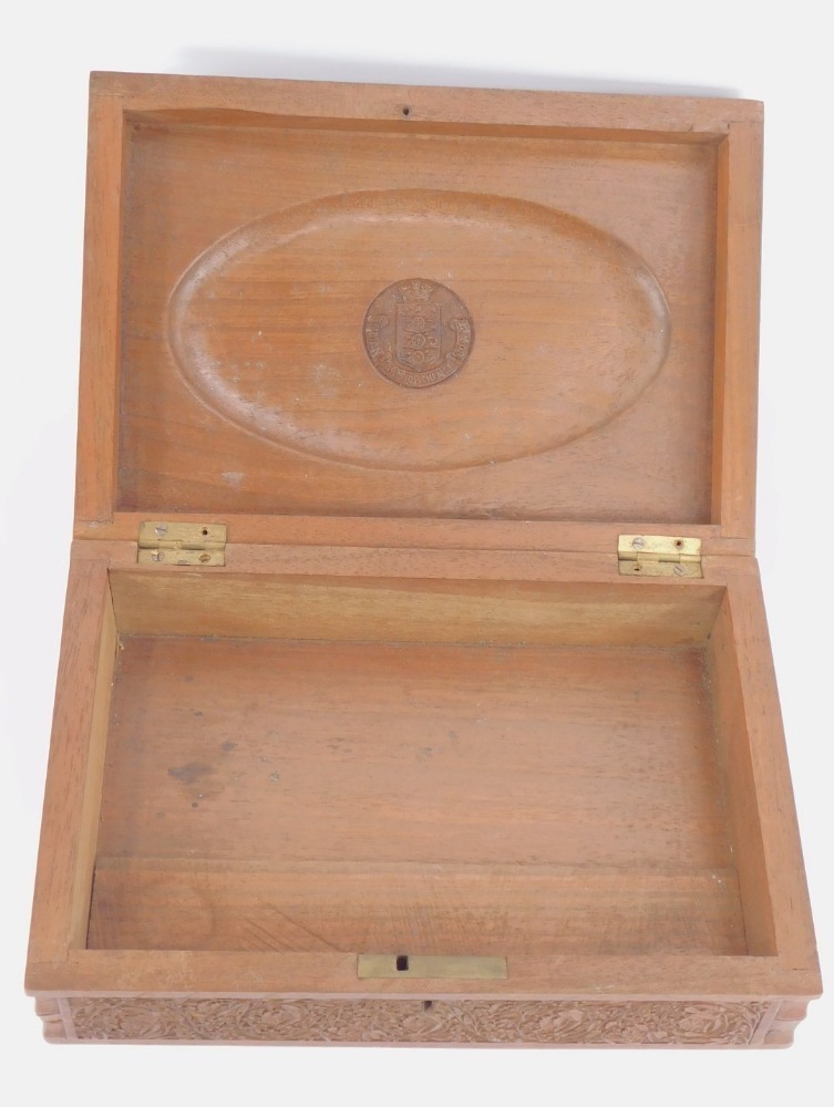 An early 20thC Anglo Indian wooden cigarette box, profusely carved with ...