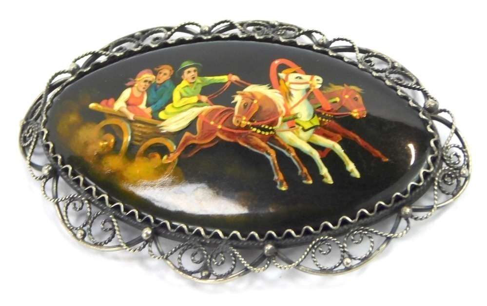 A Russian hand painted brooch, the panel depicting horse and troika ...