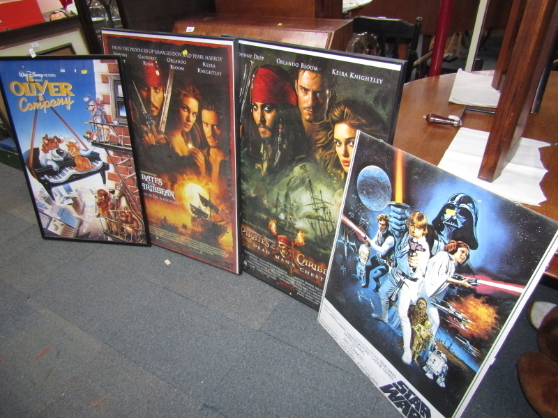 Star Wars posters, Oliver & Company advertising poster, and two framed ...