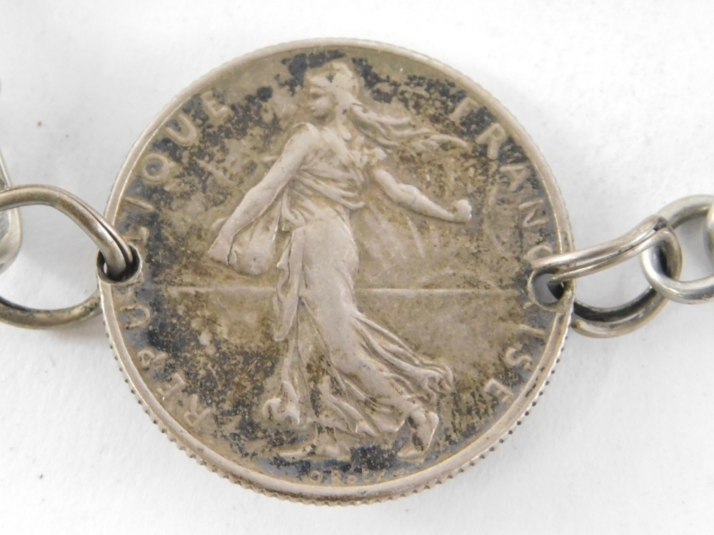 A Scottish dagger, with heavily carved turned handle, compressed pommel ...