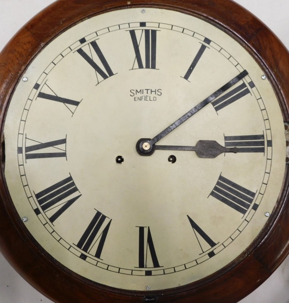 A 20thC walnut cased school clock, the 28cm diameter Roman numeric dial ...