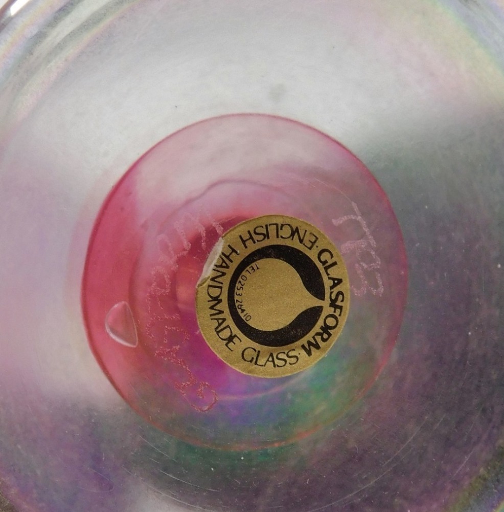 A Glasform iridescent glass scent bottle, of slender tapering form on a ...