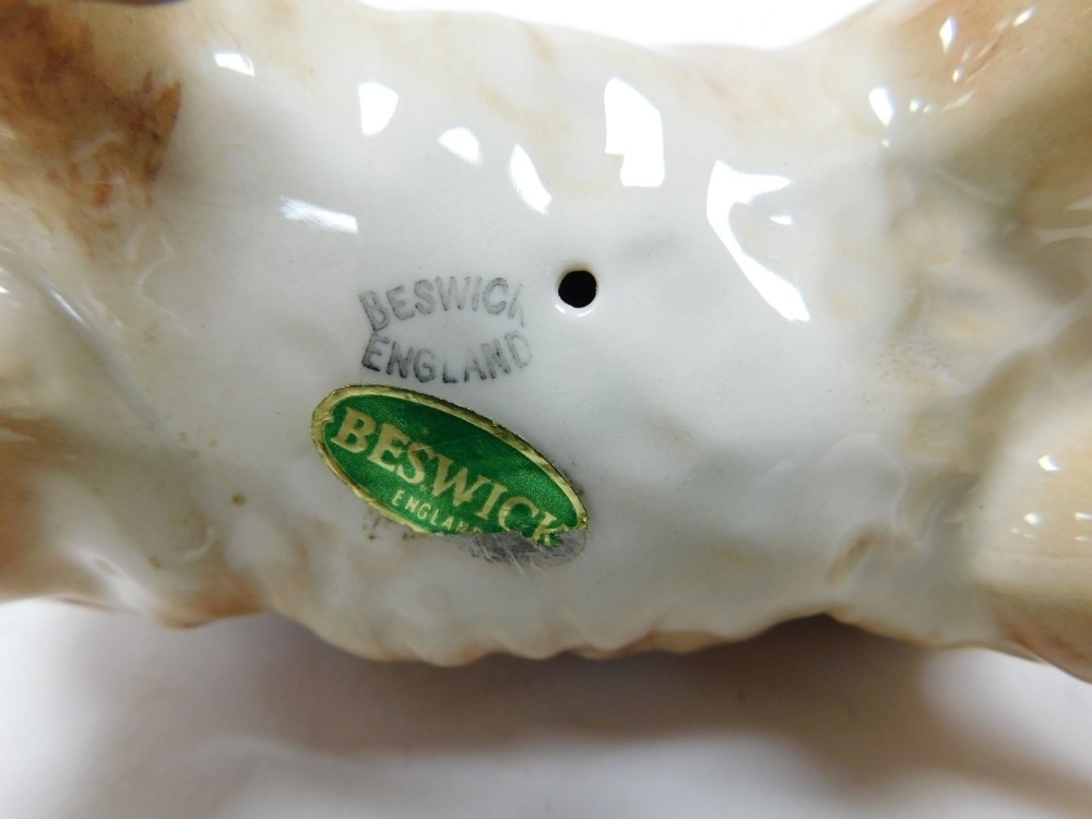 Four Beswick pottery figures modelled as ginger cats, and kittens, in ...