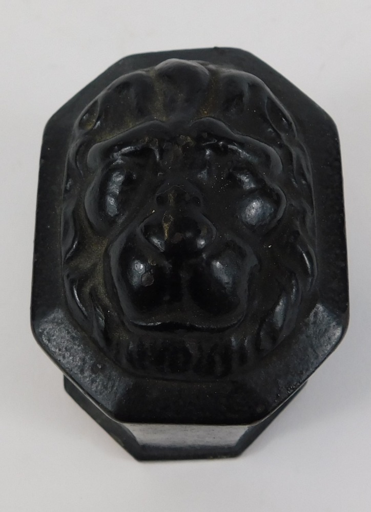 A Victorian cast iron tobacco box, of octagonal form, with an embossed ...