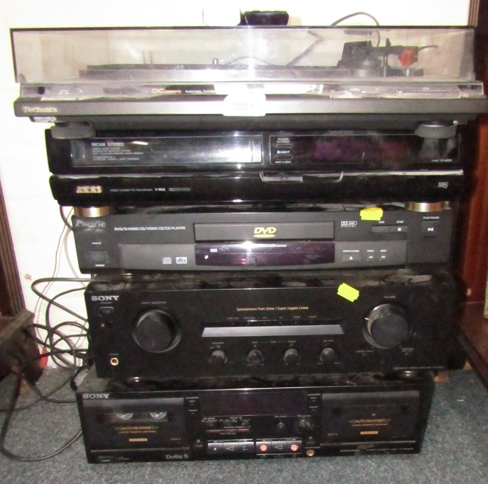 An Akai video cassette recorder, Pacific DVD video CD player, a Sony ...