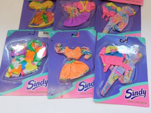 A group of Sindy clothing, each in a blister pack, and a Hasbro Sindy ...