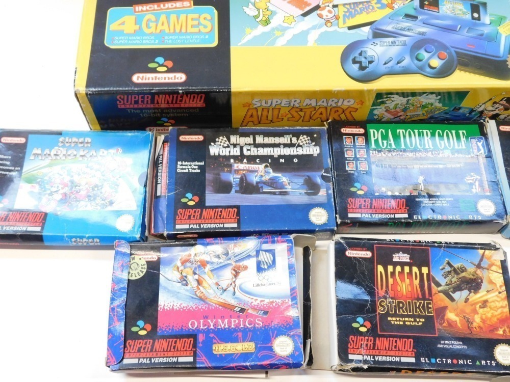 A Super Nintendo Entertainment System, with Super Mario All Stars ...