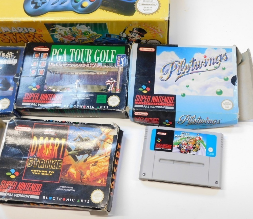 A Super Nintendo Entertainment System, with Super Mario All Stars ...