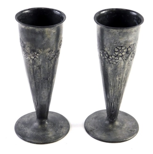 A pair of early 20thC Christopher Dresser design English pewter vases ...