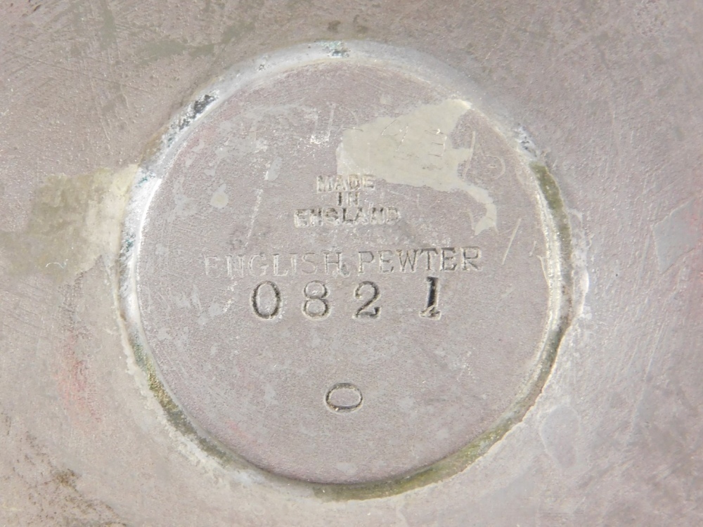 A pair of early 20thC Christopher Dresser design English pewter vases ...