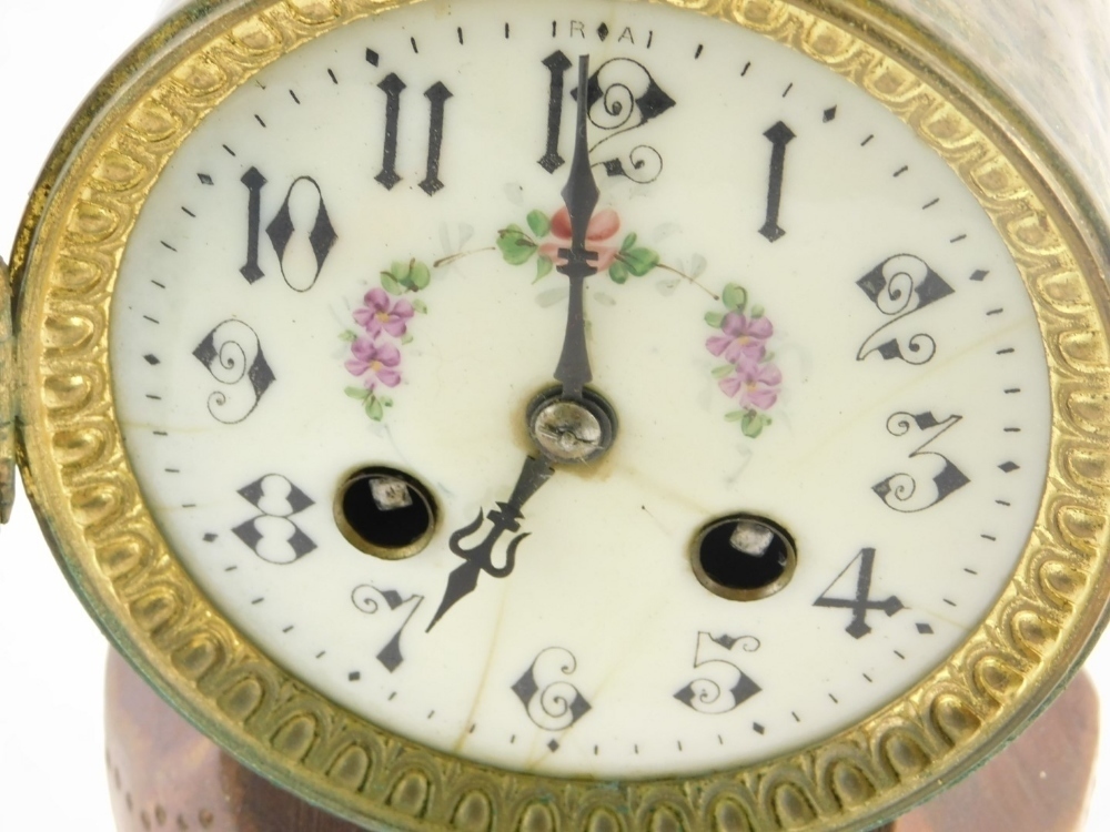 A French clock movement and dial, the dial painted with flowers and ...