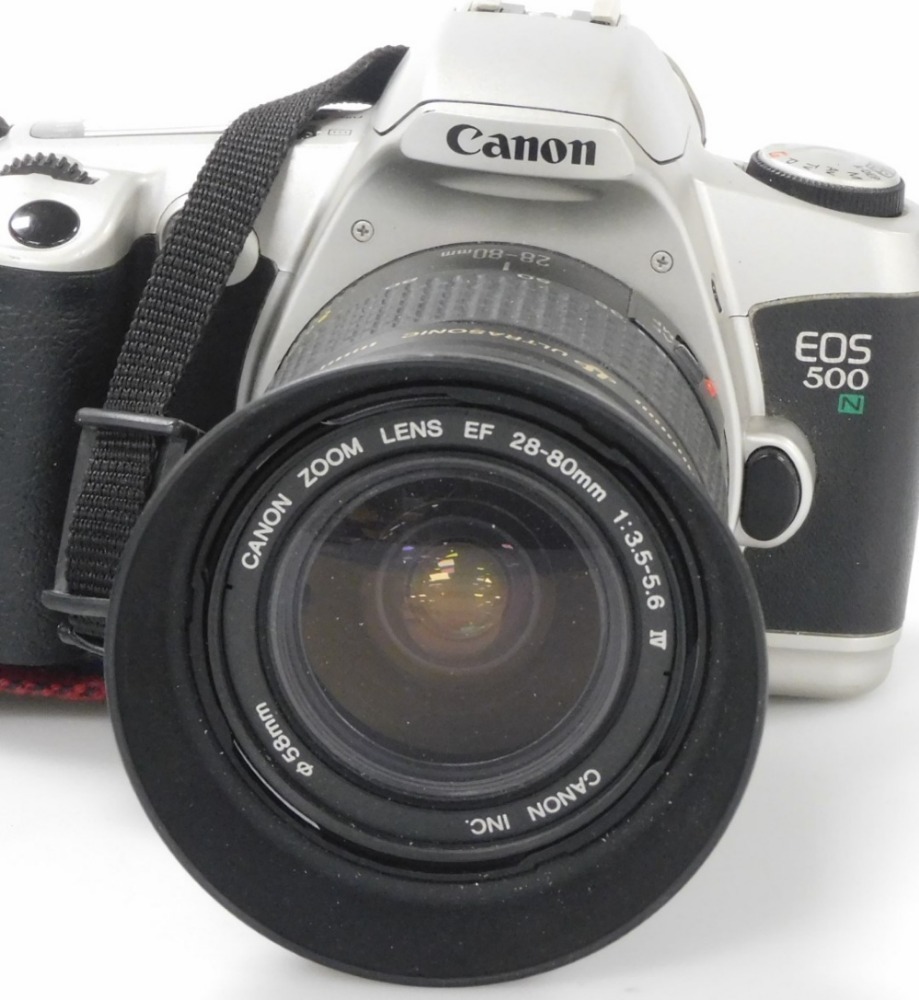 A Canon EOS500 35mm camera, together with a Dolby portable cassette ...