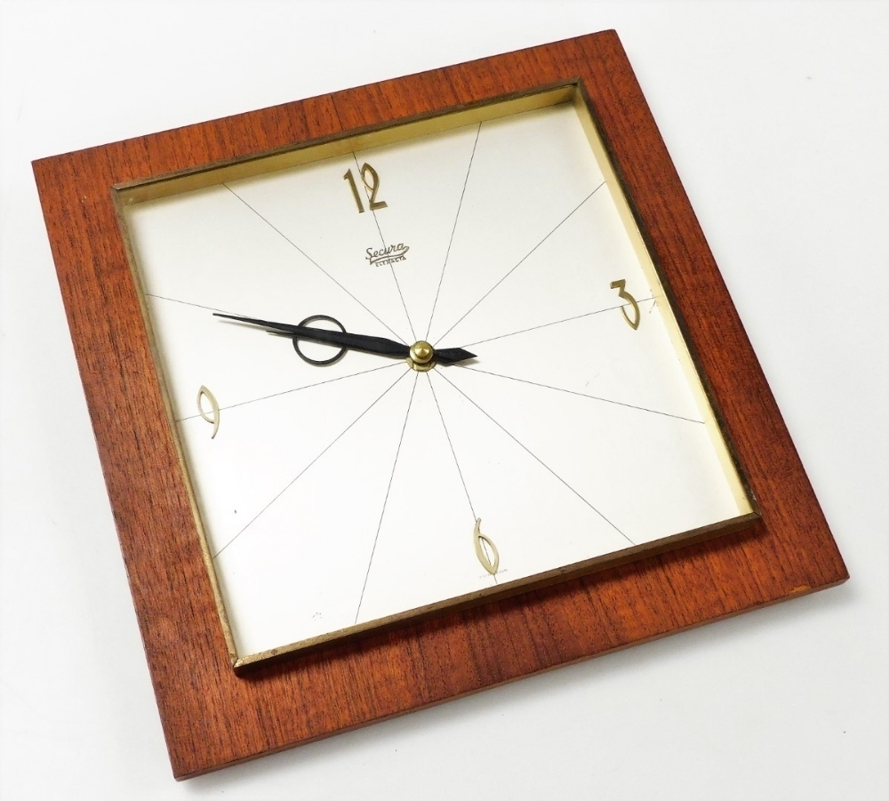 A mid century Secura Elexacta teak cased wall clock, square dial ...