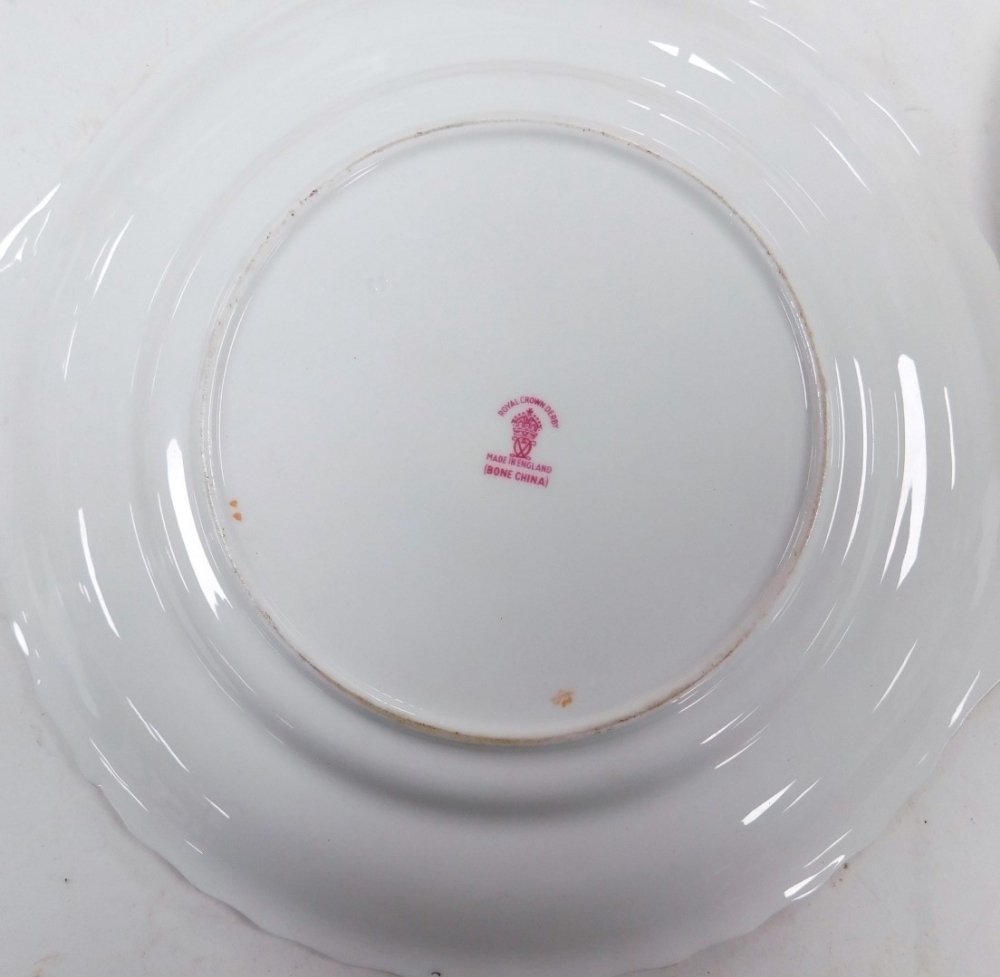 A group of Royal Crown Derby porcelain plates and dishes, including the ...