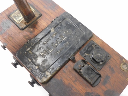 A mid century Megger vintage voltmeter wooden cased testing set, number ...
