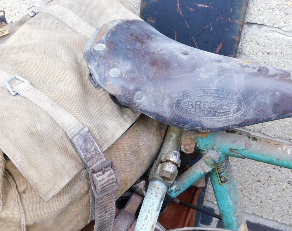 A vintage Reynolds tandem bicycle, in green trim, with leather seats ...