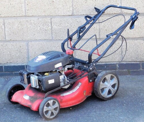 Withdrawn to be offered in our next sale A Frisky Fox 5.5hp petrol lawn mower