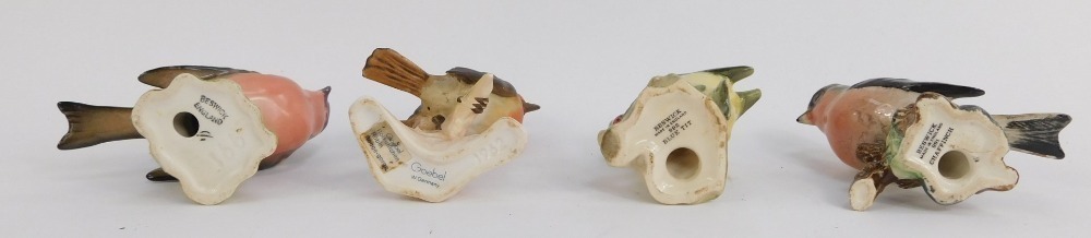 A group of four pottery birds, Beswick Blue Tit, two Chaffinches, and a ...