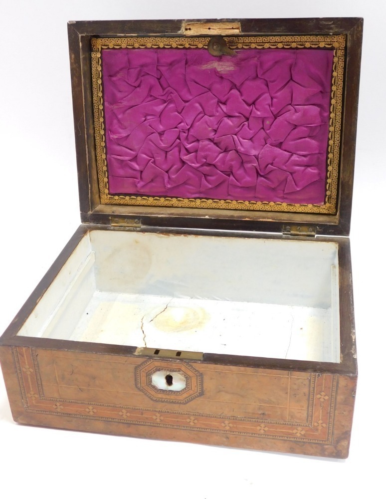 A Victorian walnut sewing box, with a domed top, inlaid with mother of ...