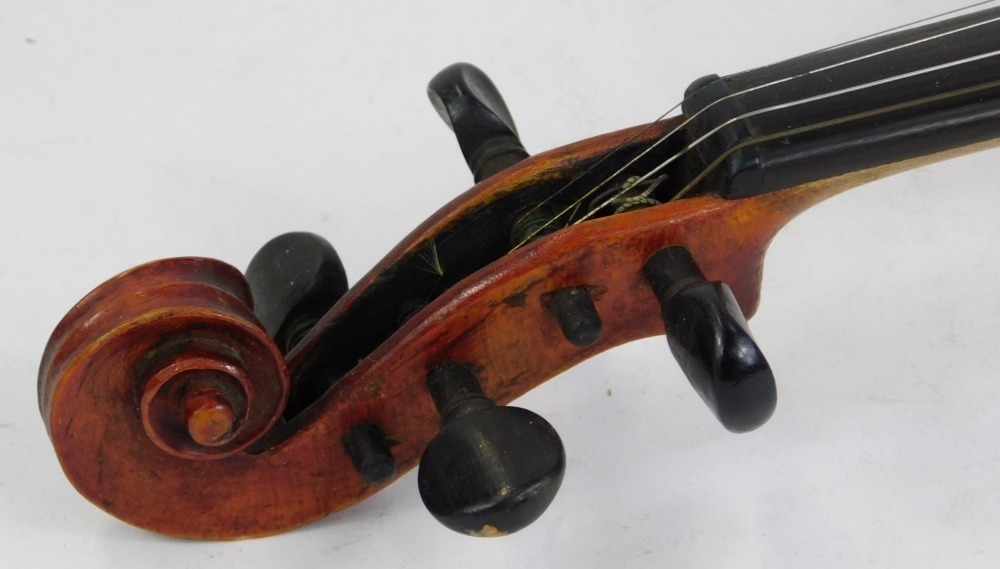 A two piece back violin, bears label for Jan Podesva, houslar, v Brne ...