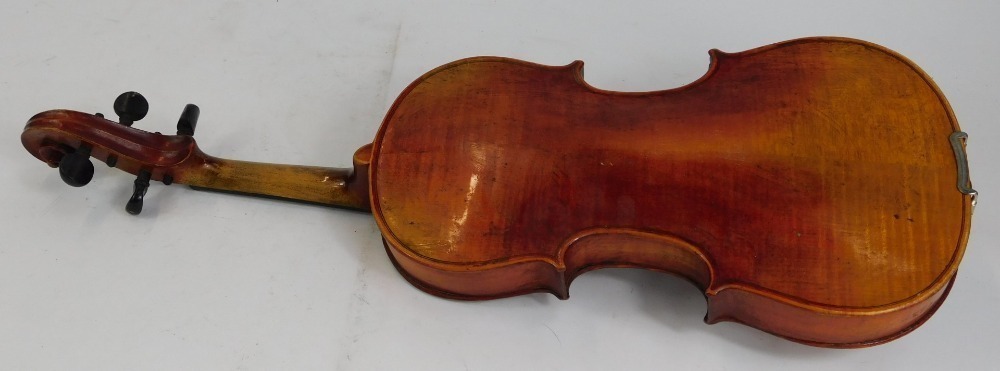 A two piece back violin, bears label for Jan Podesva, houslar, v Brne ...