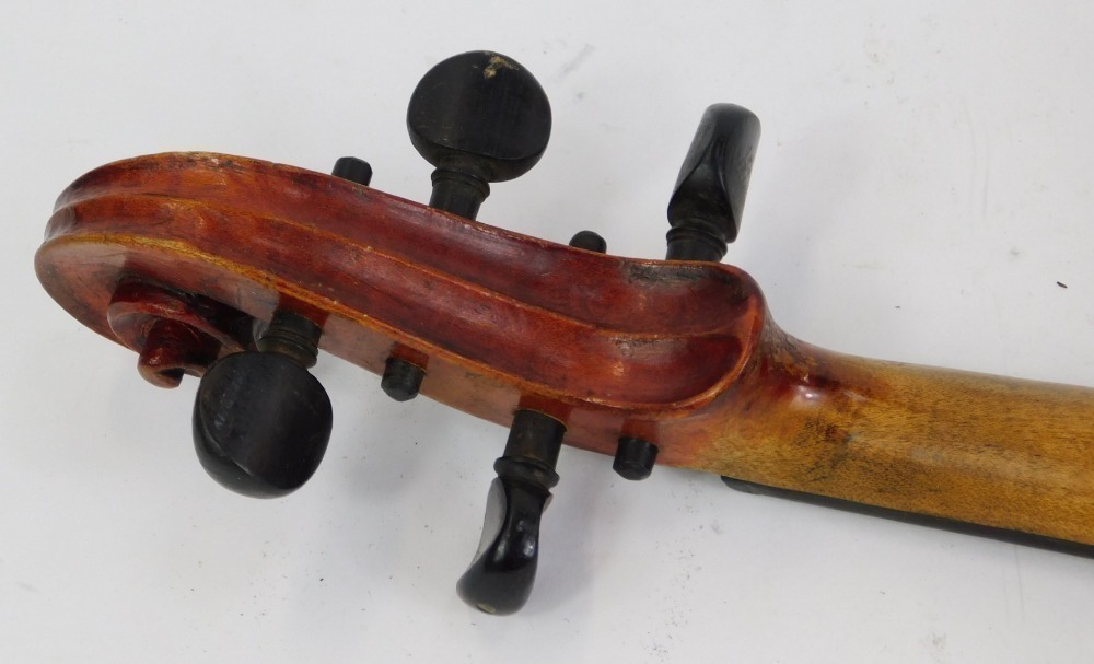 A two piece back violin, bears label for Jan Podesva, houslar, v Brne ...