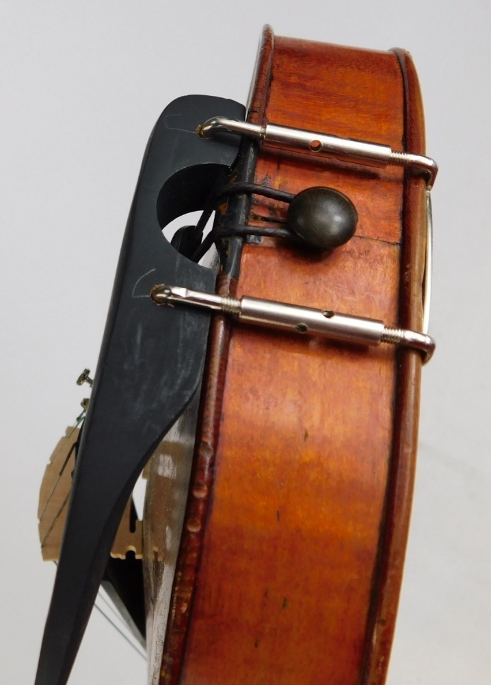 A two piece back violin, bears label for Jan Podesva, houslar, v Brne ...