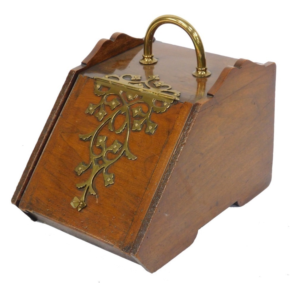 A Victorian oak coal box, with brass carrying handle and hinged strap ...
