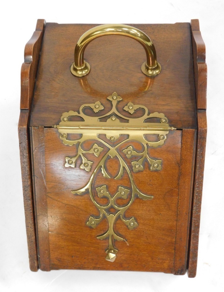 A Victorian oak coal box, with brass carrying handle and hinged strap ...
