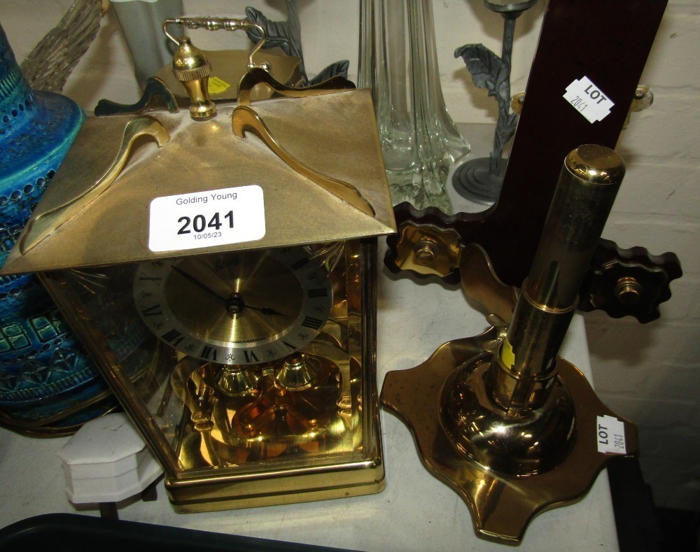 A Schatz anniversary clock, in brass casing with silvered Roman numeric ...